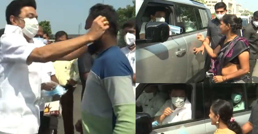 മാസ്കില്ലാതെ ചിലർ; വണ്ടിയിൽ നിന്നിറങ്ങി തടഞ്ഞുനിർത്തി മാസ്ക് വച്ചുനൽകി ...