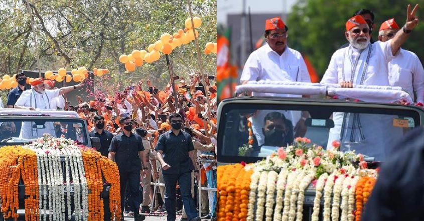 ഥാറിനു മുകളിൽ കൈവീശി മോദി; വണ്ടി ആഘോഷത്തിന് പറ്റിയതെന്ന് ആനന്ദ് ...