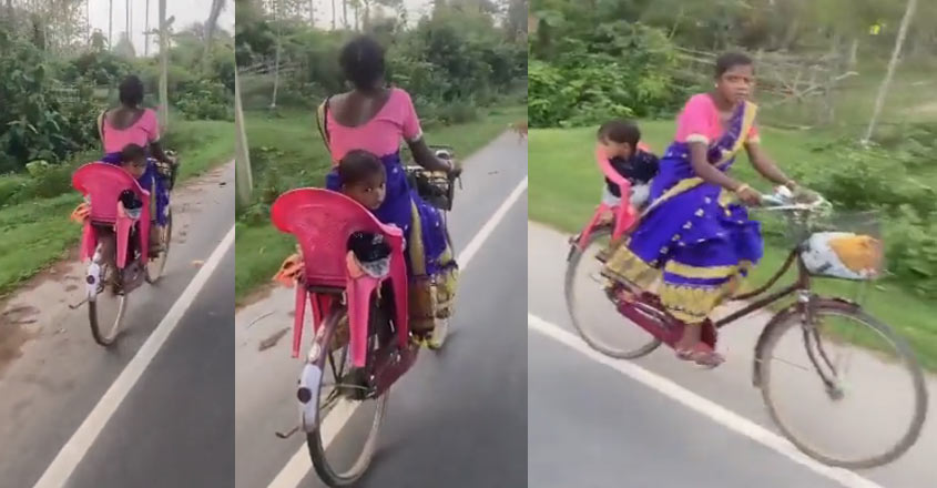 സൈക്കിളിനു പിന്നിൽ കസേര വച്ചുകെട്ടി; കുഞ്ഞിന് സുഖയാത്ര; അമ്മയ്ക്ക് ...